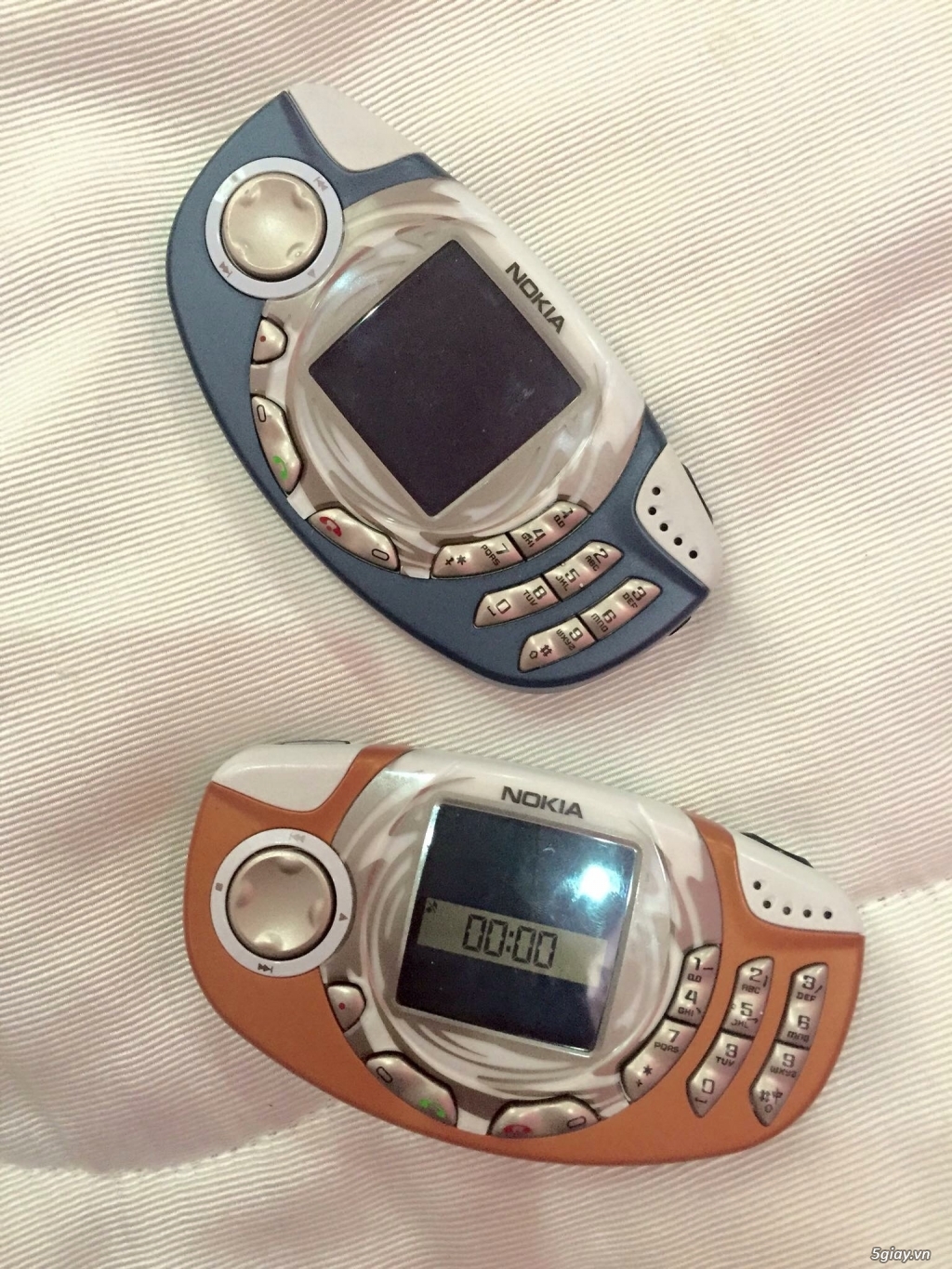 Nokia 3300a xanh và cam,5610 trắng T-mobile, 7500 đen, 6230i,3310 tím ...
